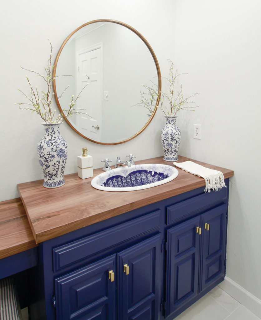 Vintage Sink Inspired Blue and White Bathroom - Deeply Southern Home