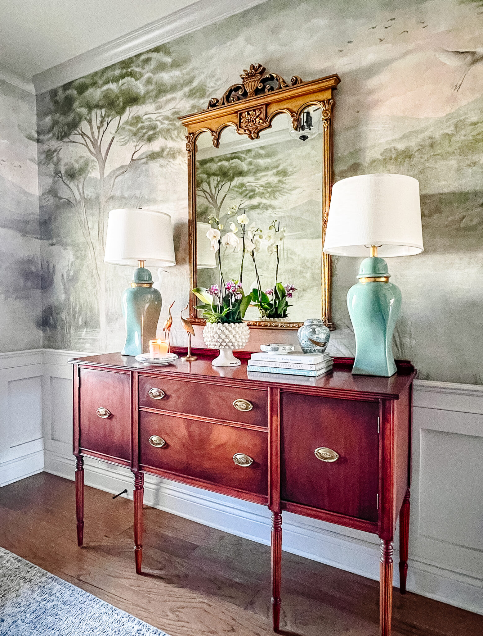 Pastoral Landscape Mural Envelops the Foyer - Deeply Southern Home