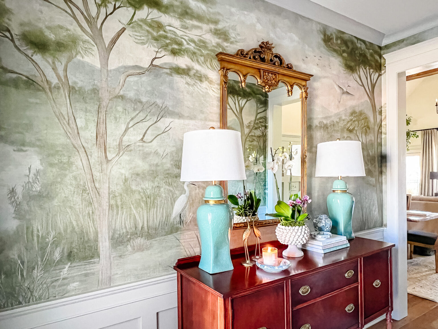 Pastoral Landscape Mural Envelops the Foyer - Deeply Southern Home